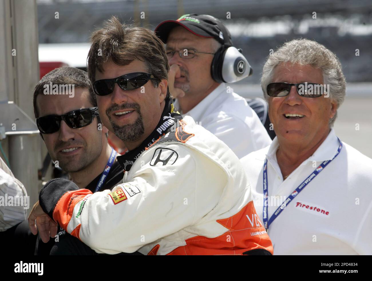 Indy Racing League driver Dario Franchitti, of Scotland, left, joins ...