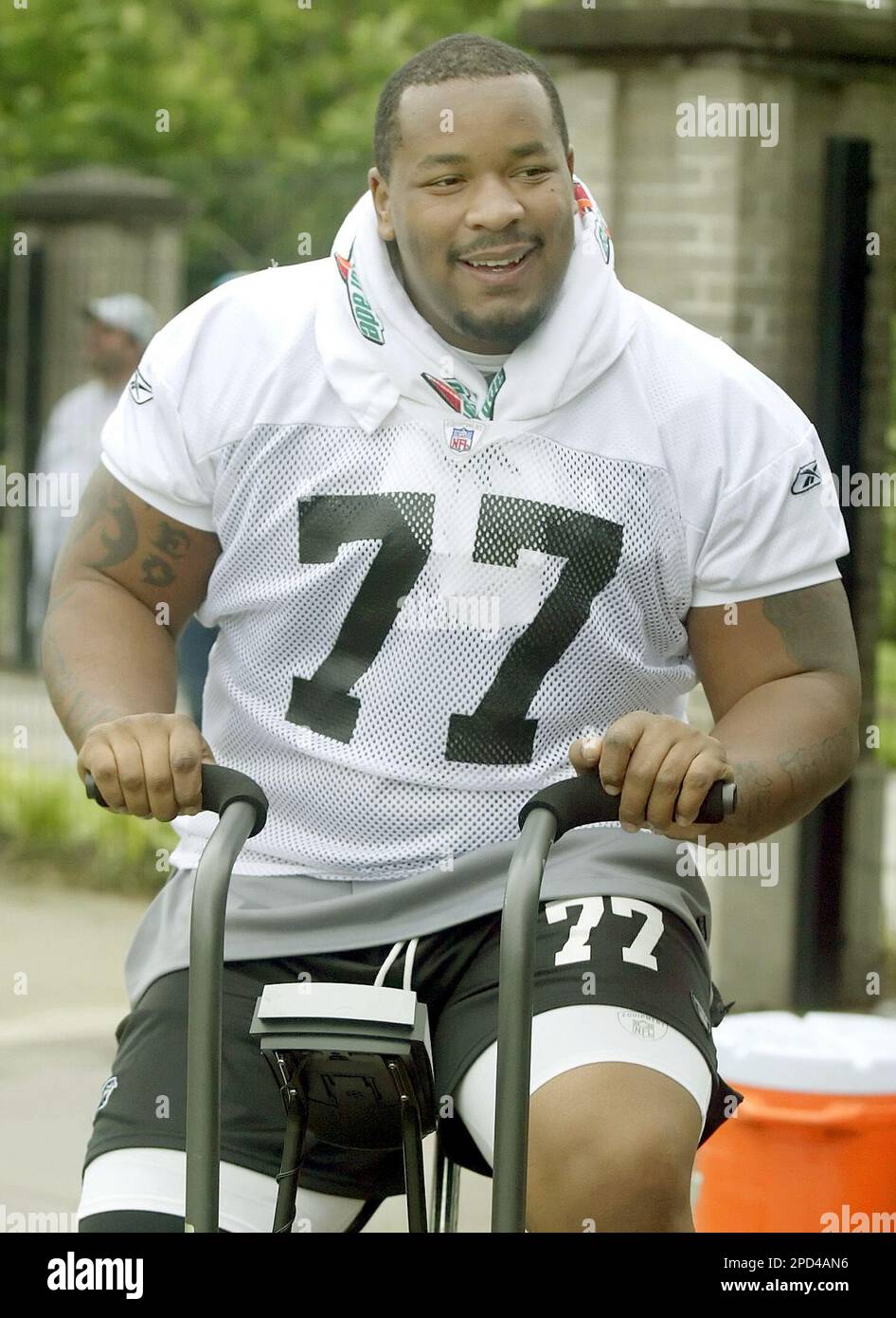 Carolina Panthers' tackle Kris Jenkins rides a stationary bike during ...