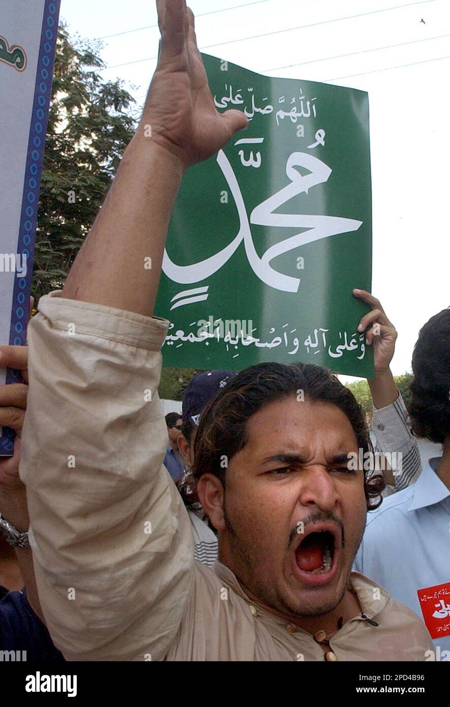An activist of a Pakistani religious group chants slogans during an ...