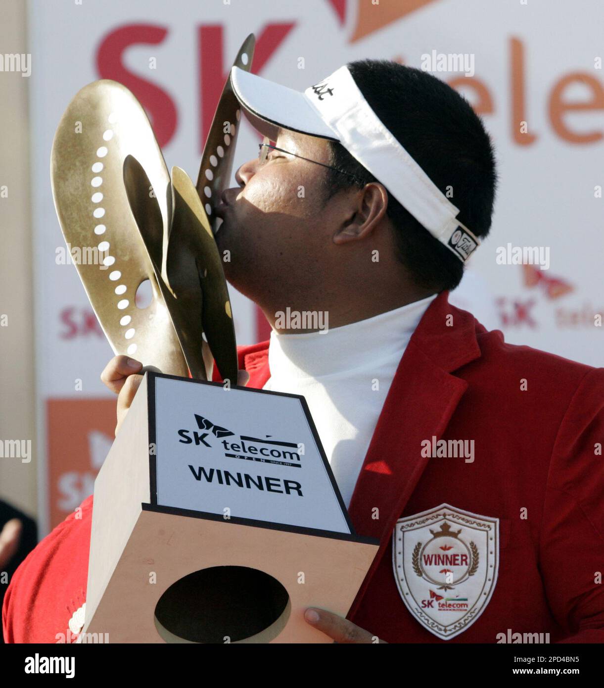 Prom Meesawat from Thailand kisses to trophy after winning the US ...