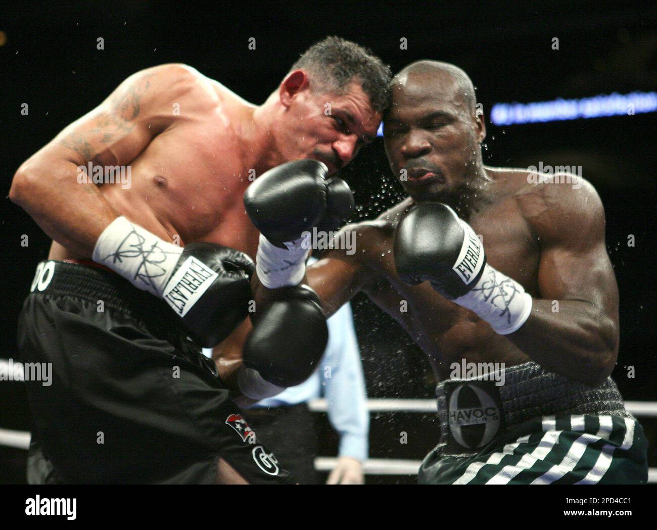 Randy Griffin, right, lands a punch on Annibal Acevedo, of Puerto Rico ...