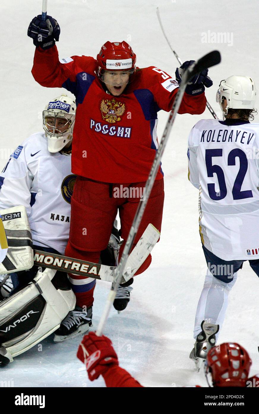Russia's Dmitri Bykov, center, celebrates his goal against Kazakhstan's ...