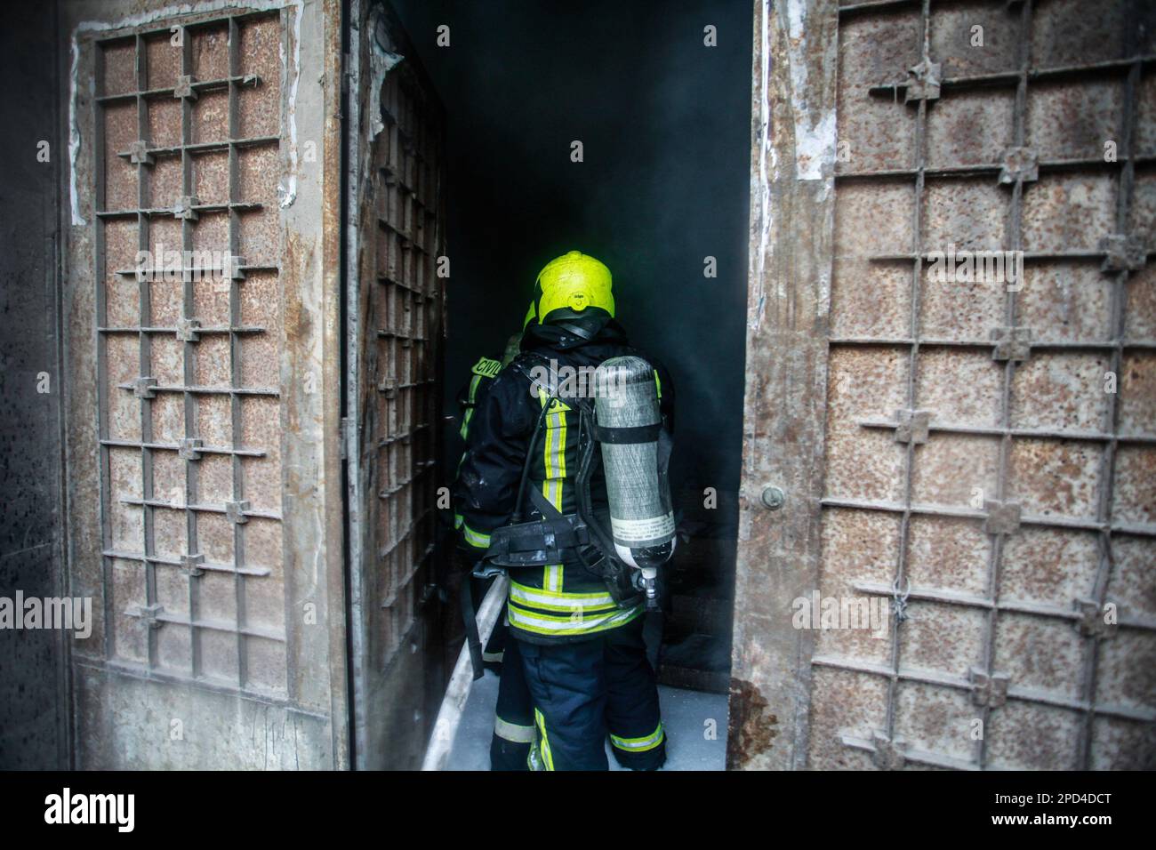 Nablus, Palestine. 14th Mar, 2023. Civil defense officers extinguish a ...
