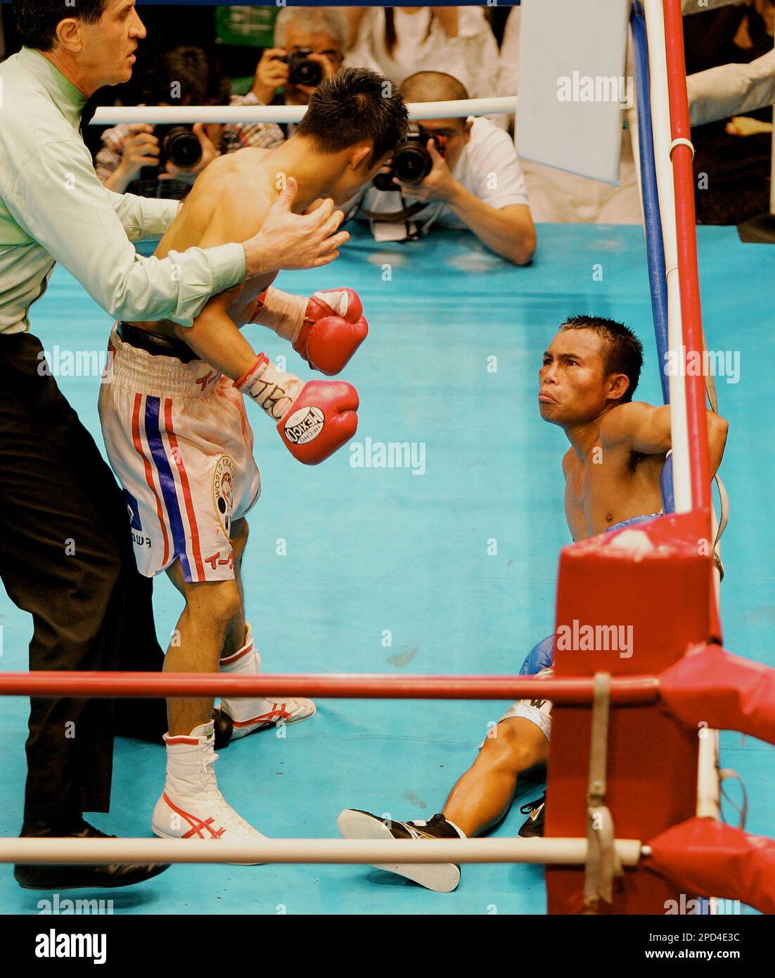 Thai champion Eagle Kyowa looks down challenger Rodel Mayol of ...