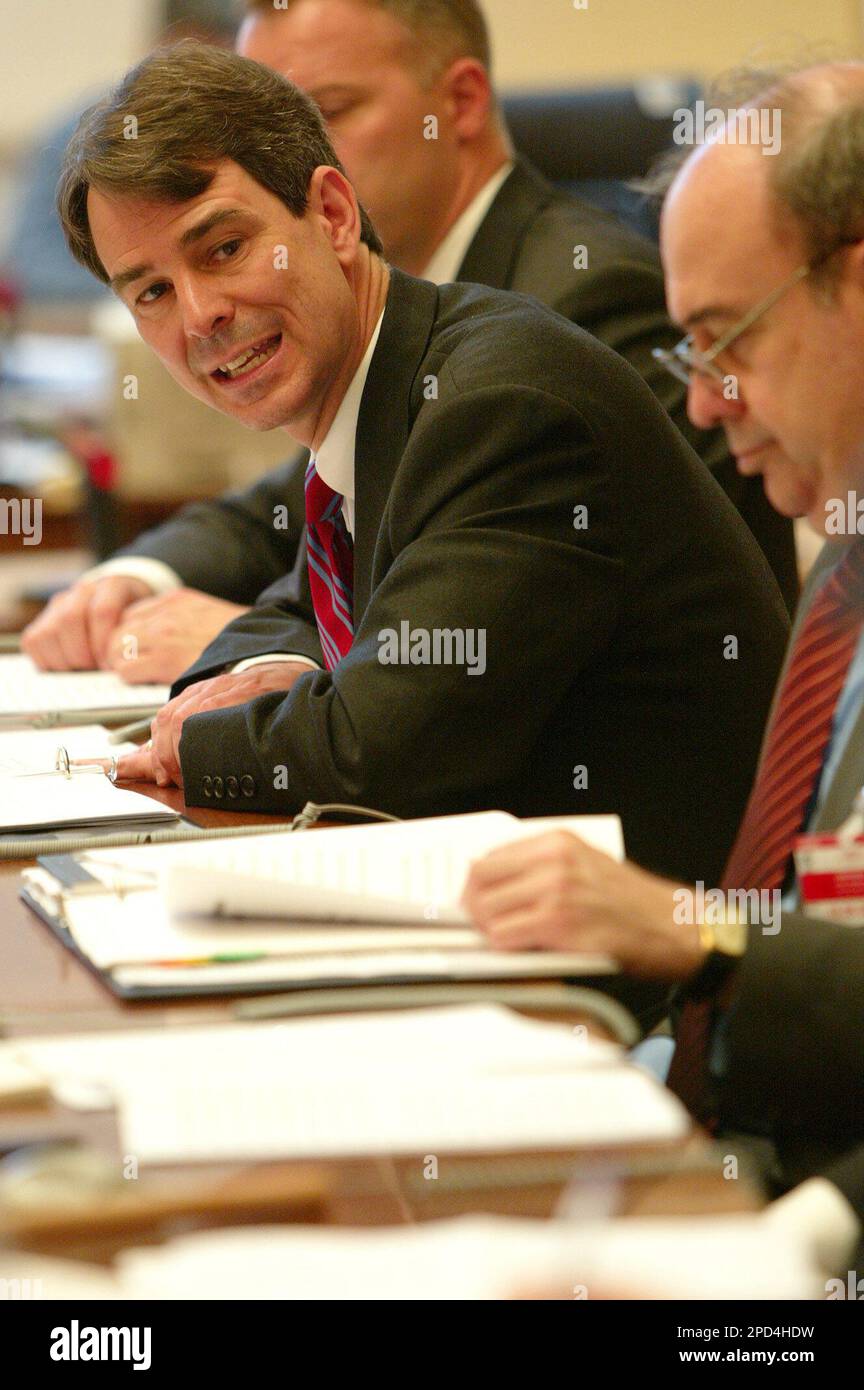 John B. Bellinger III, U.S. State Department lawyer, left, speaks as U ...