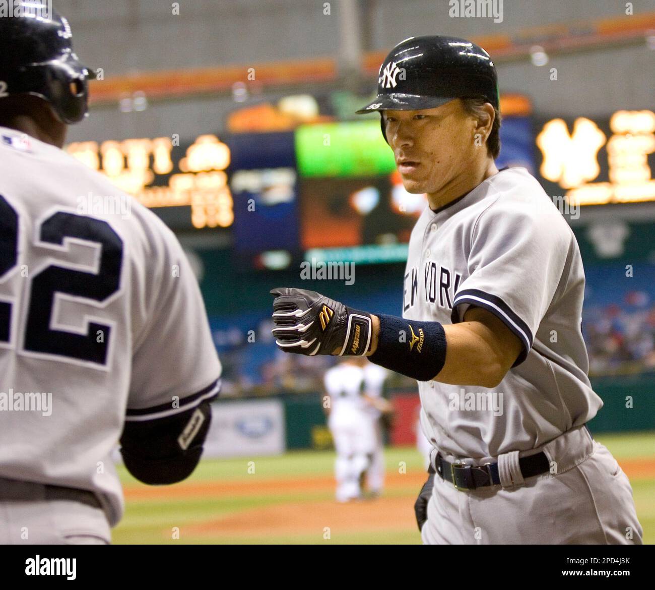 New York Yankees' Hideki Matsui, right, of Japan, is congratulated by ...