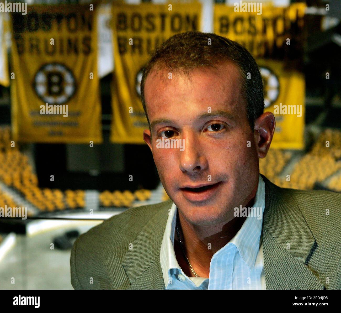Boston Bruins Executive Vice President Charles Jacobs poses in front of ...