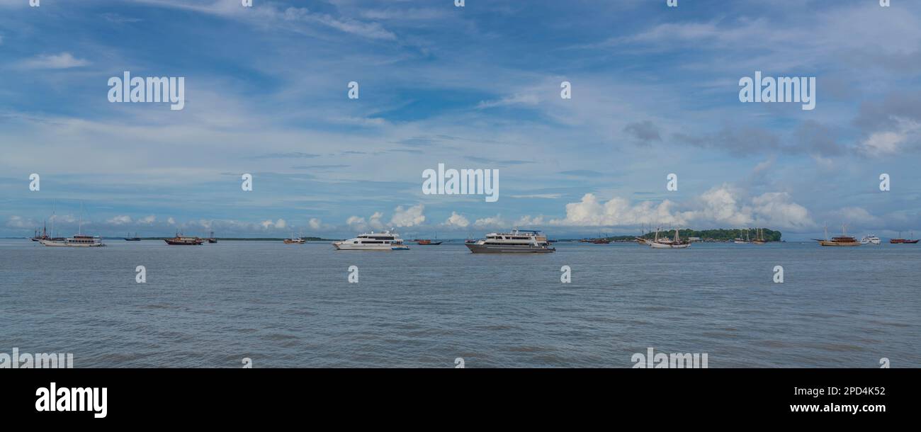 View from the ferry to Waisai at Sorong with cruises and tour boats ...