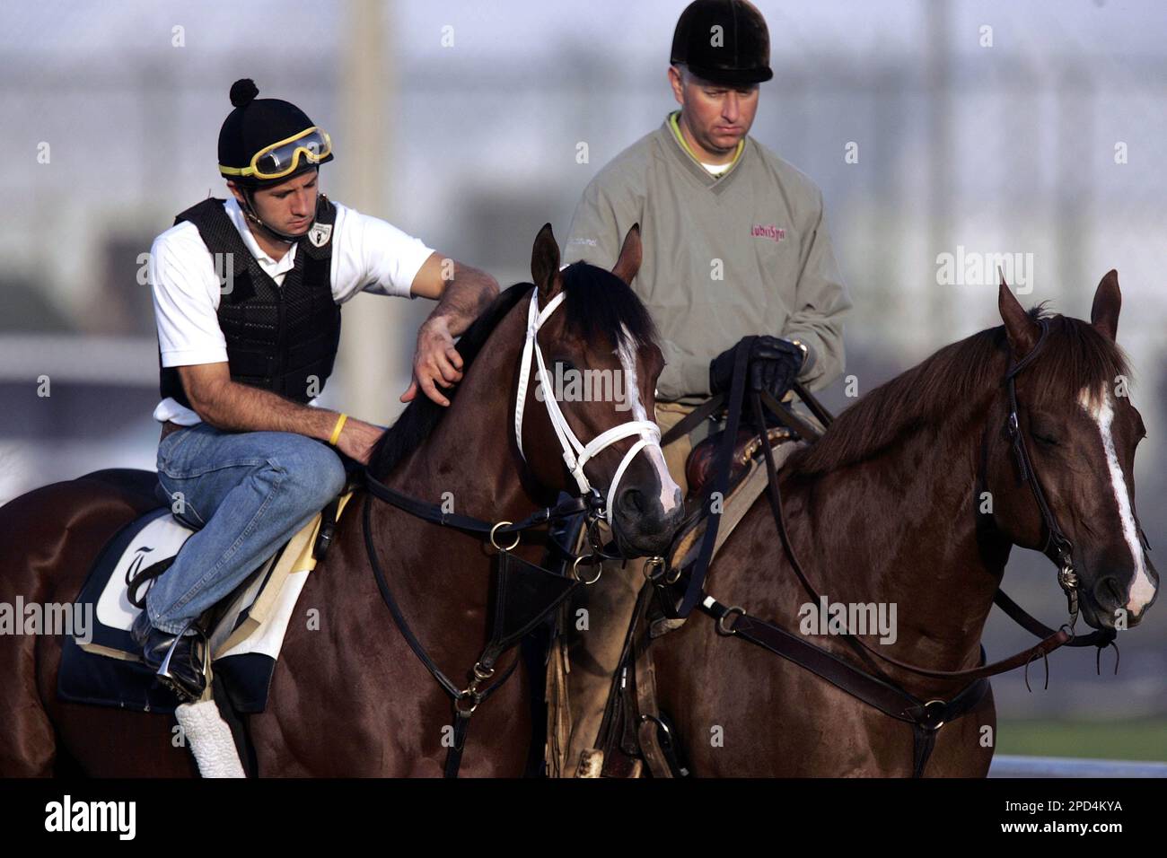 Kentucky Derby entrant Keyed Entry with exercise rider Jacob Roberts up ...