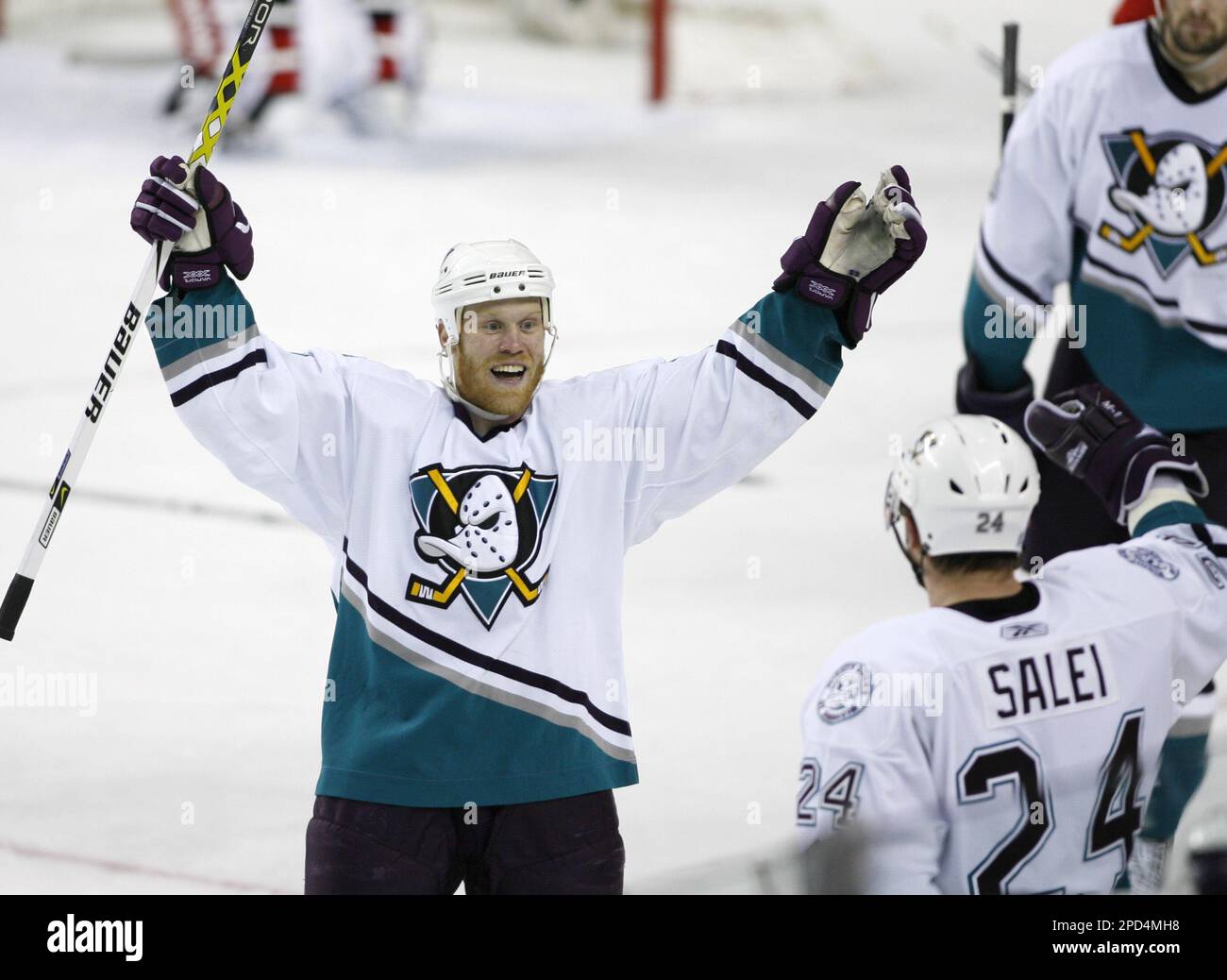 Mighty Ducks of Anaheim's Todd Marchant, left, celebrates the team's ...