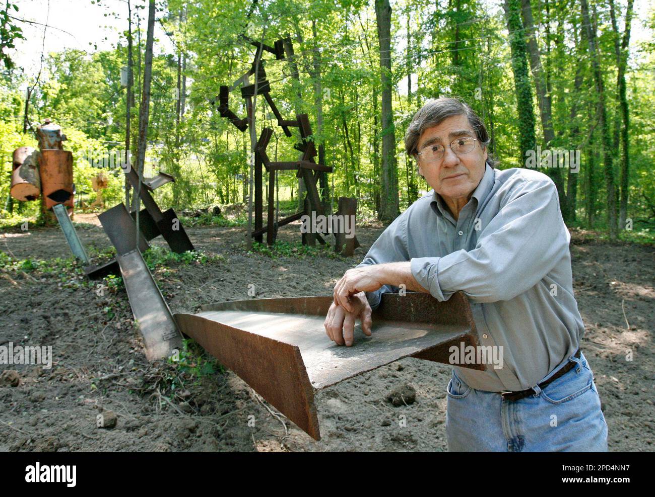 Demetrios Mavroudis is seen with some of his sculptures on April 28 ...