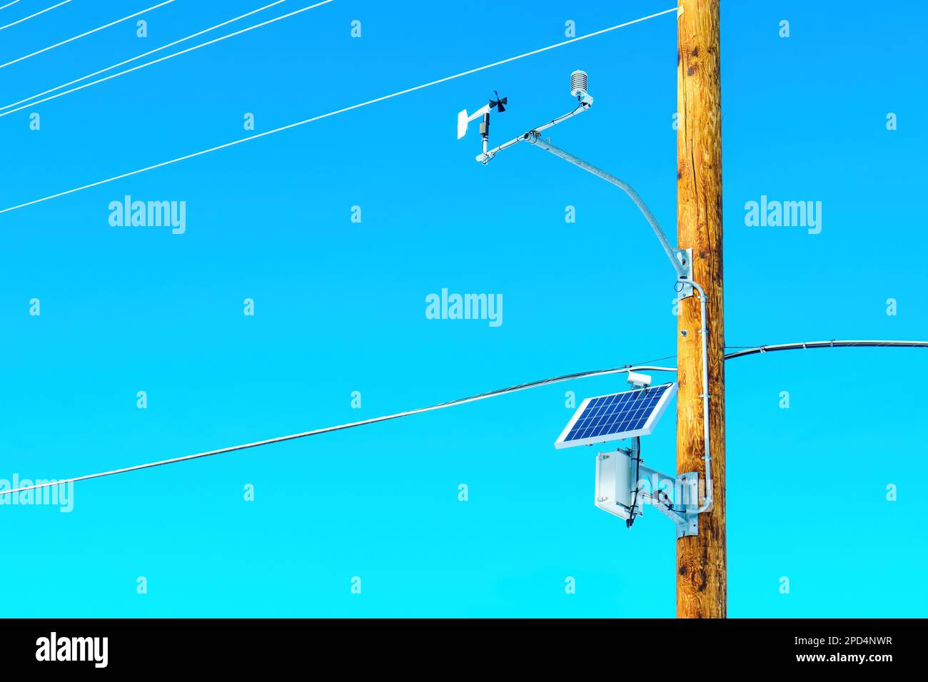 Solar panel and auxiliary equipment installed on a wooden pole of an ...