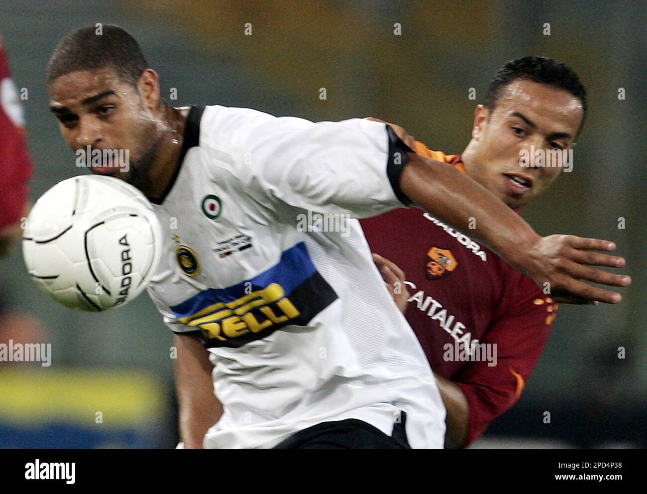 AS Roma's Houssine Kharja of Morocco, right, and Inter of Milan's ...