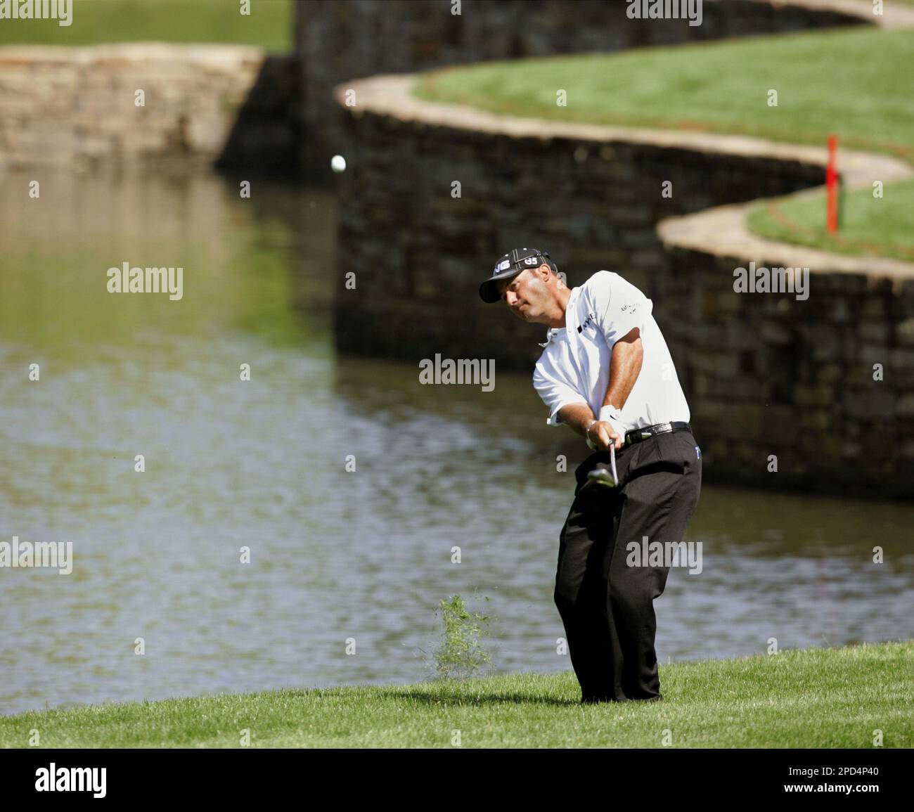 Chris DiMarco hits to the seventh green during the pro-am of the ...