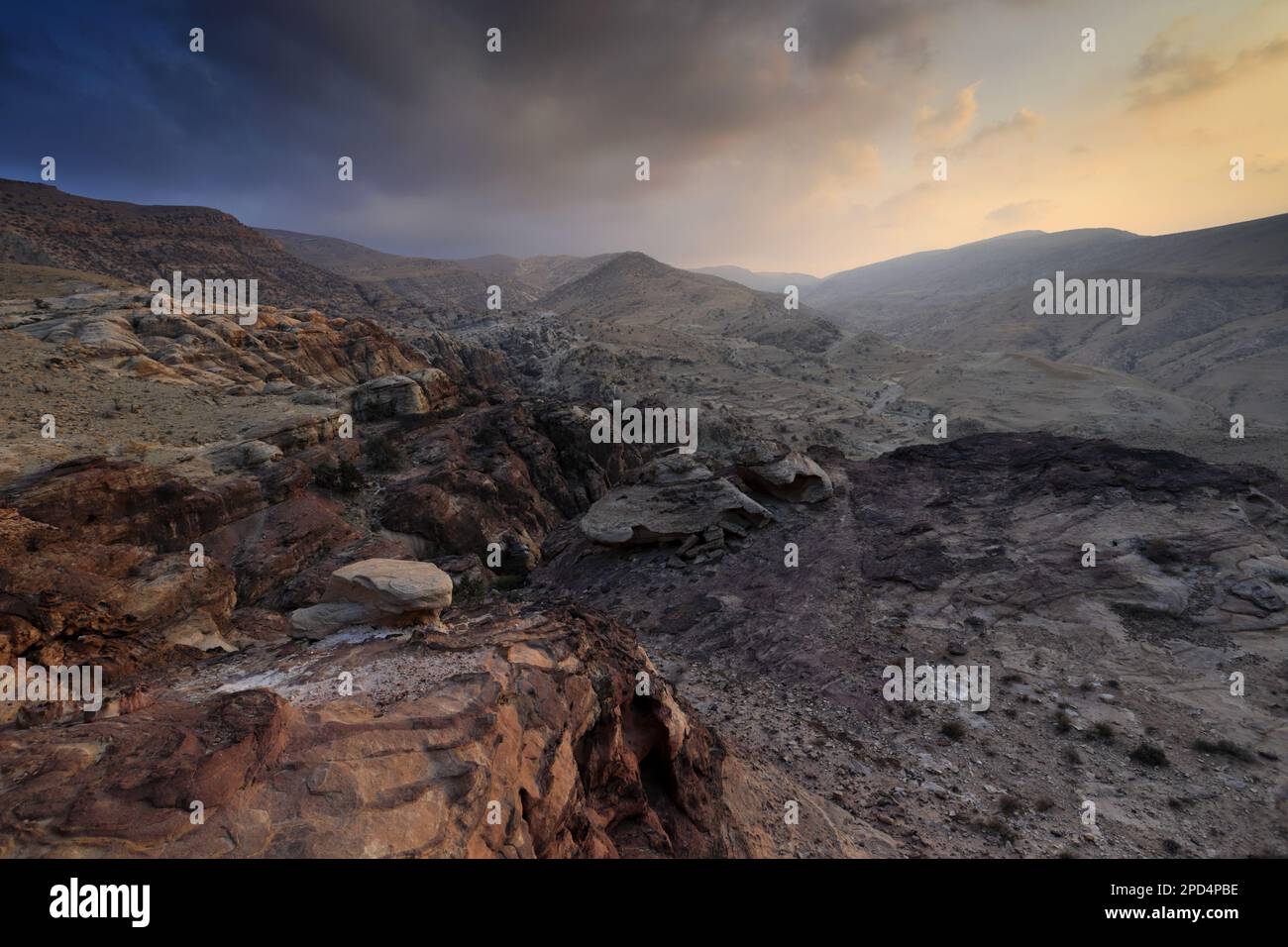Sunset over the sandstone landscape of Reis al Fied, Wadi Feid, Jordan ...