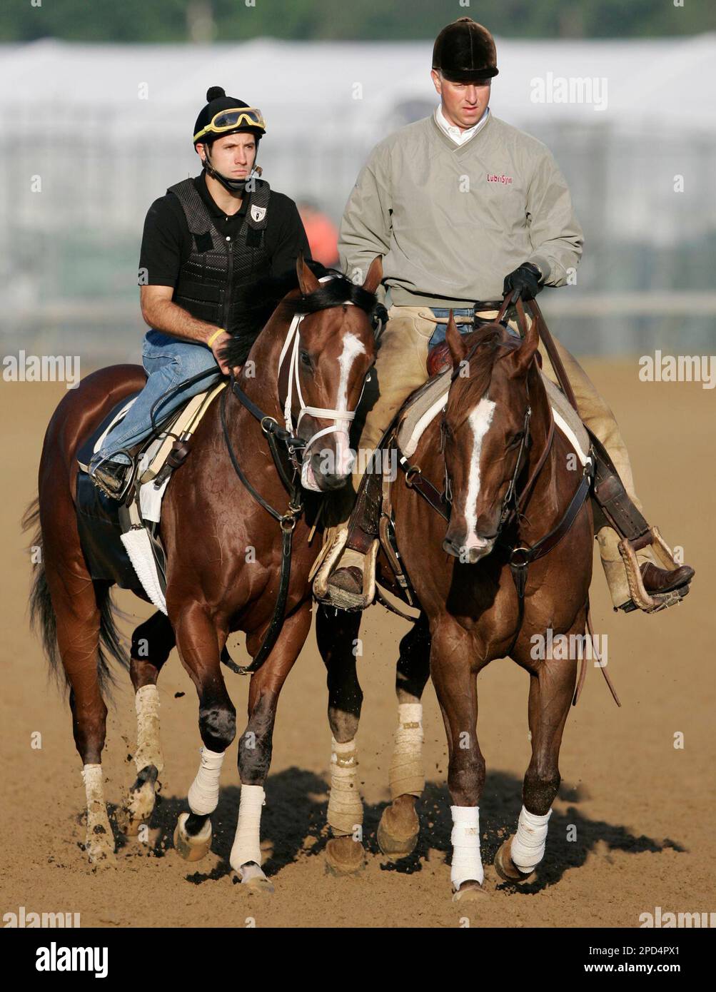 Trainer Todd Pletcher, right, leads Kentucky Derby hopeful Keyed Entry ...
