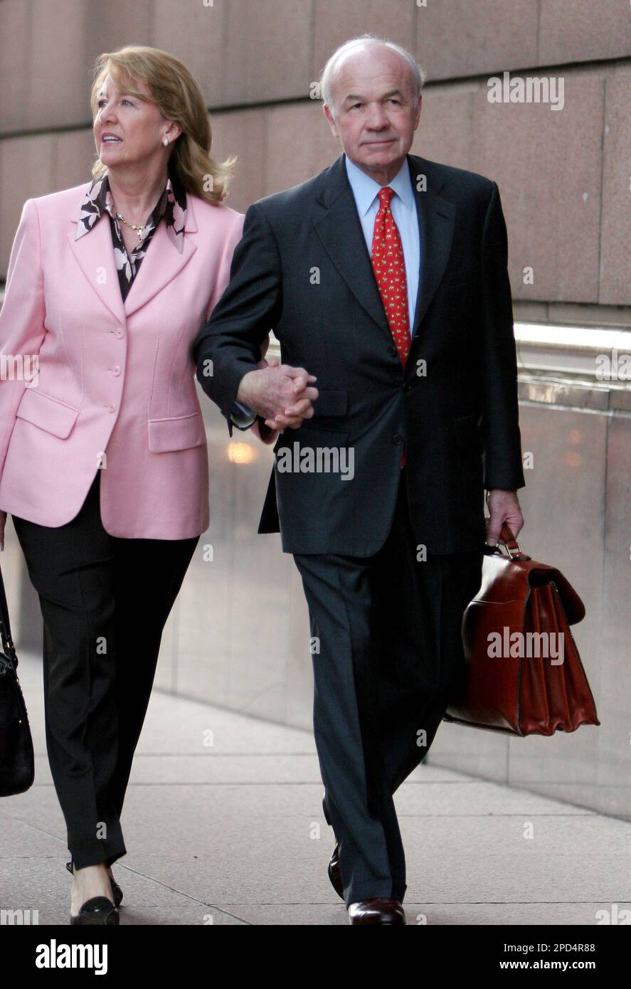 Enron founder Kenneth Lay and his wife Linda walk to the courthouse for ...