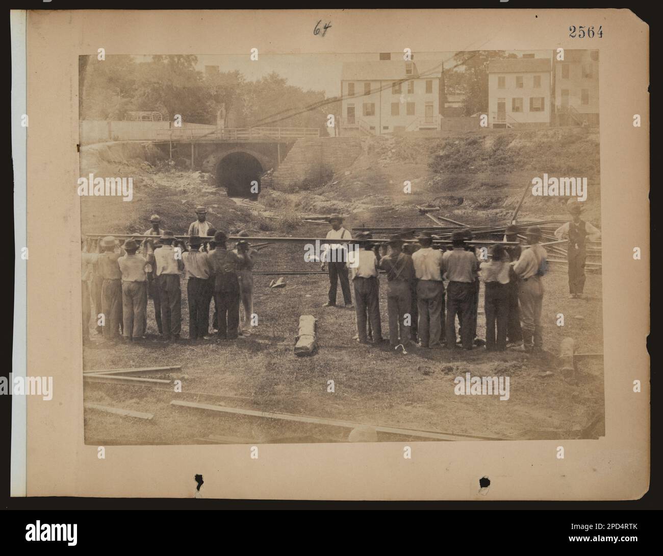 Railroad construction workers holding track. Forms part of Civil War ...
