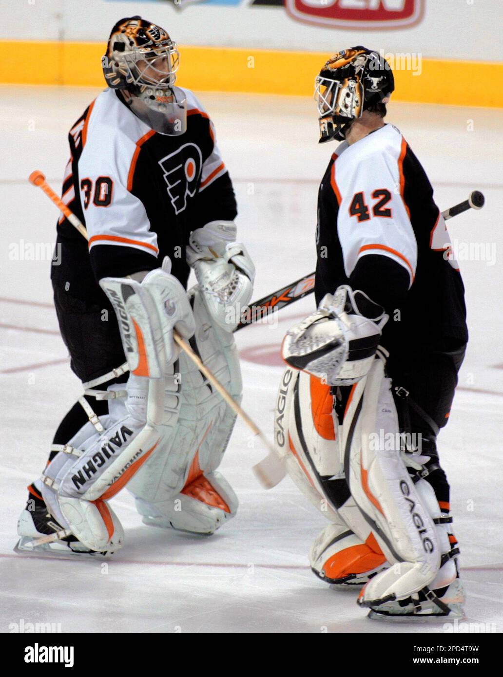 Philadelphia Flyers goalie Robert Esche (42) leaves the ice as he is replaced in the second ...