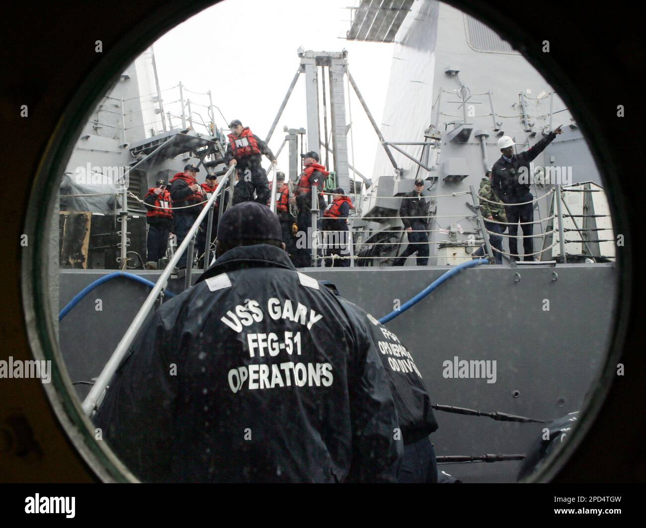 Sailors of the USS Gary prepare for departure at Yokosuka naval base in ...