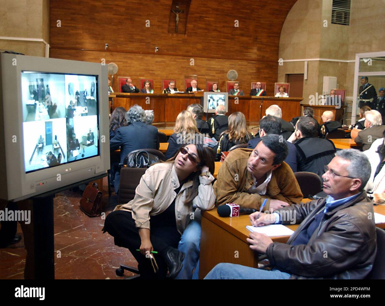 Journalists sit in the Appeal court in Palermo, Sicily, Italy, Tuesday ...