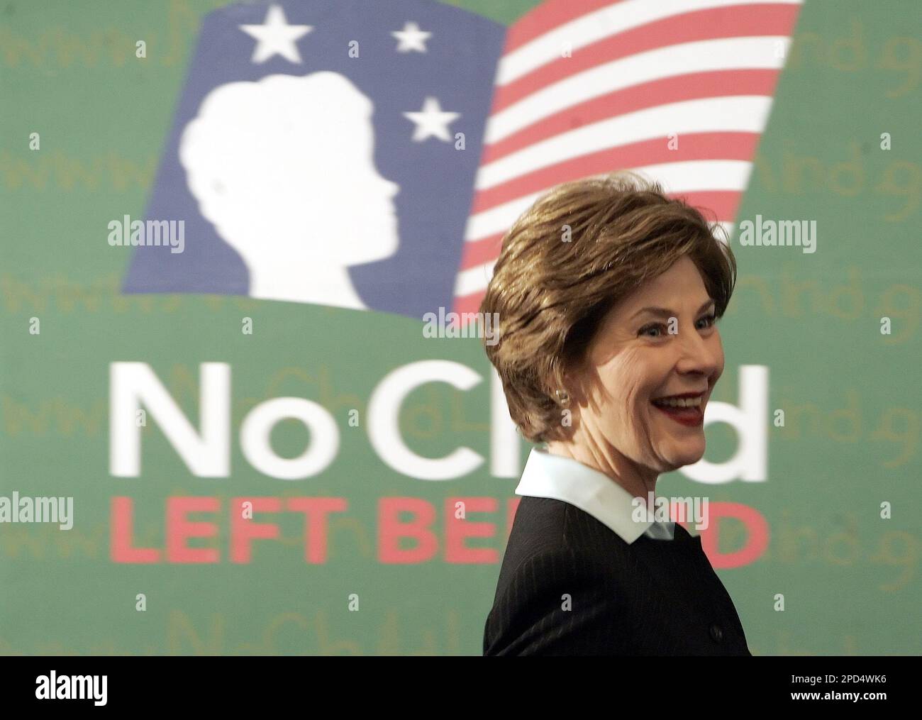 First lady Laura Bush walks into Thurber House for a roundtable ...