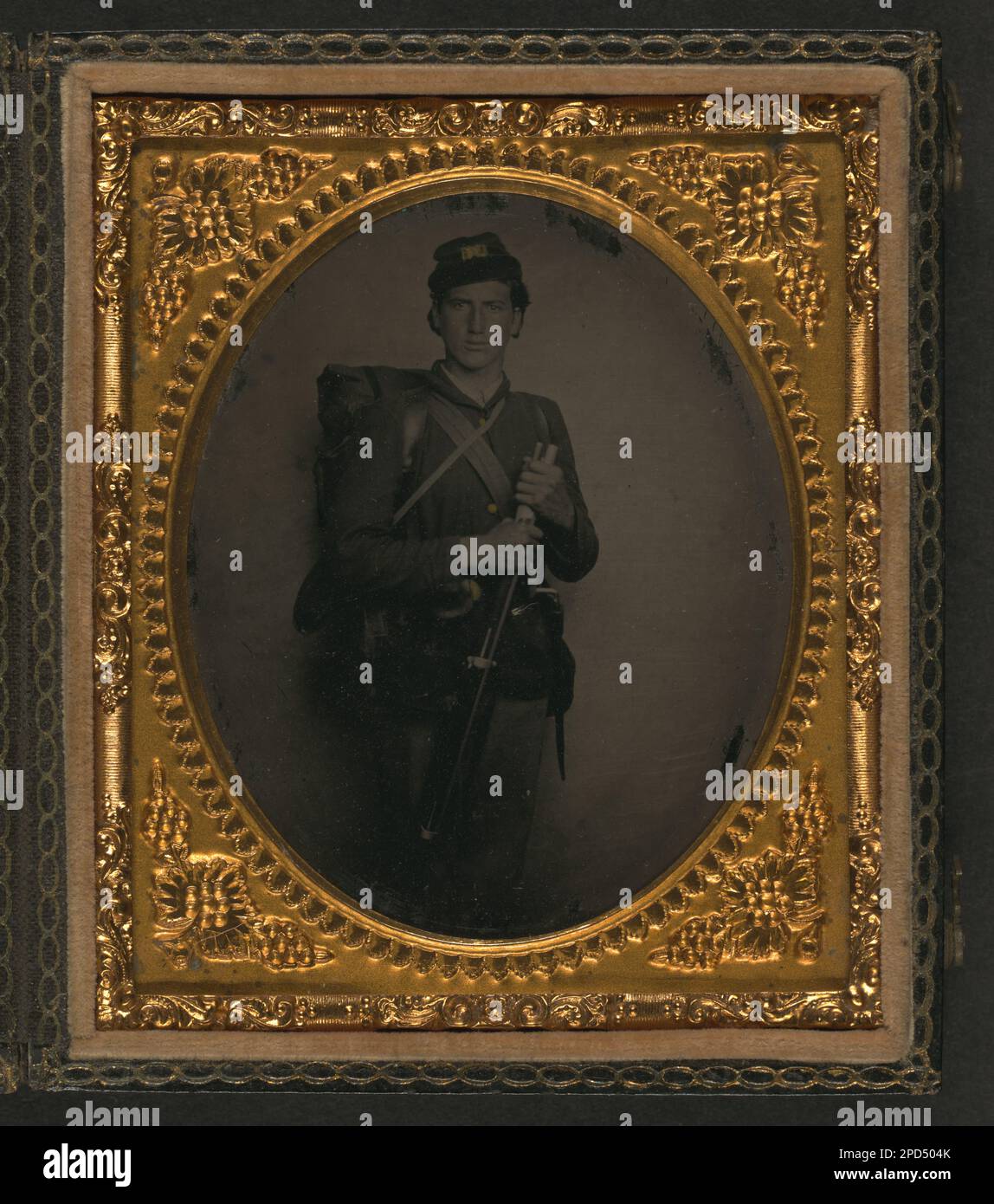 Unidentified soldier in Union uniform with musket, bayonet and scabbard ...