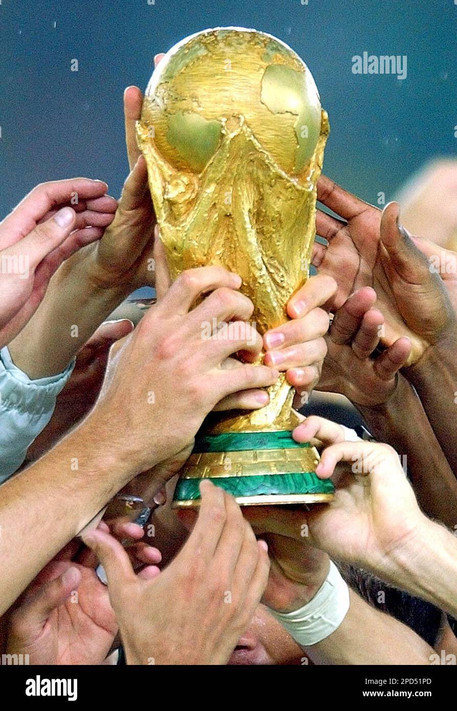 ** FOR USE AS DESIRED WITH WORLD CUP STORIES ** Brazilian hands hold ...