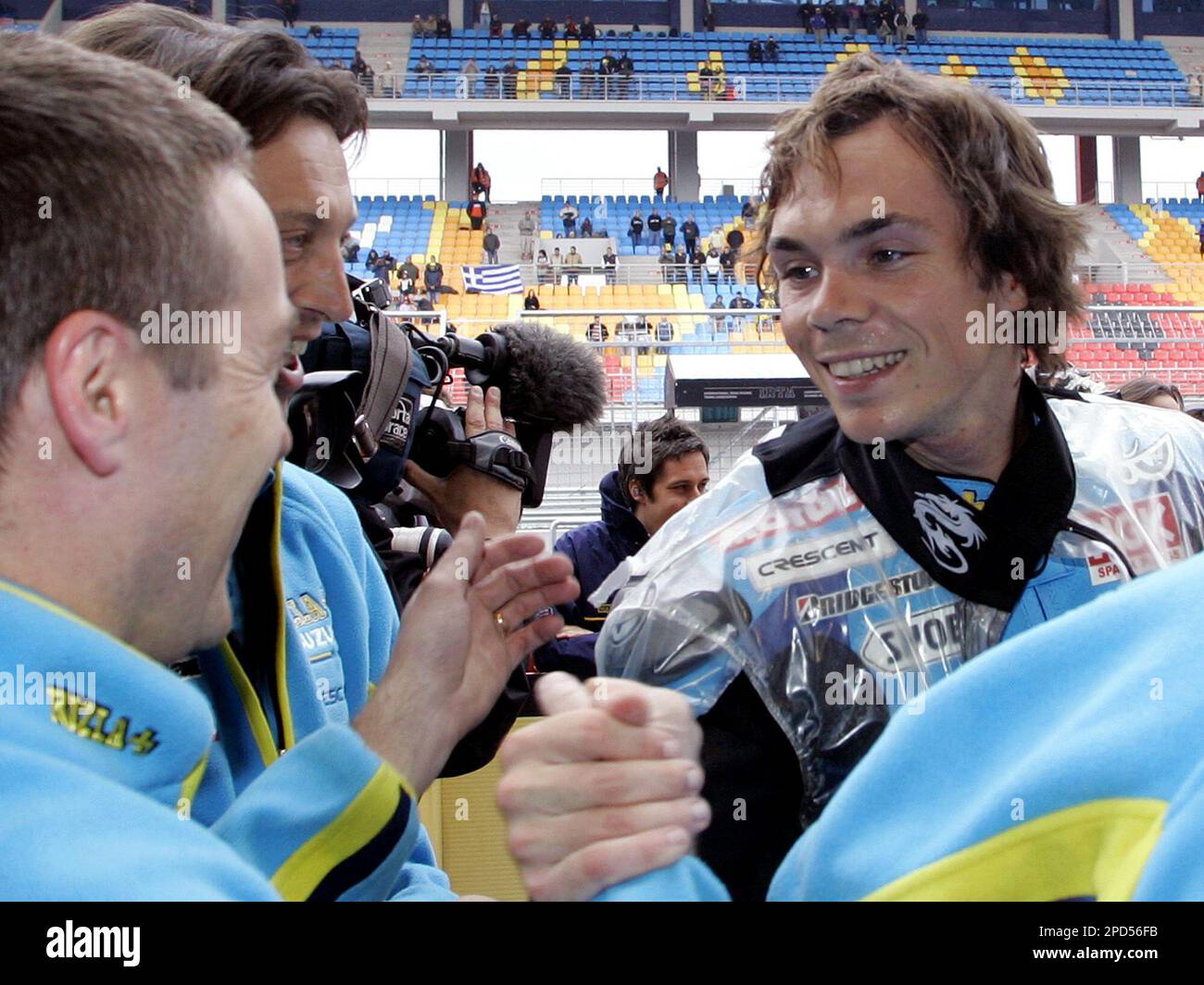 Rizla Suzuki Team Moto GP rider Chris Vermeulen of Australia, right, is ...