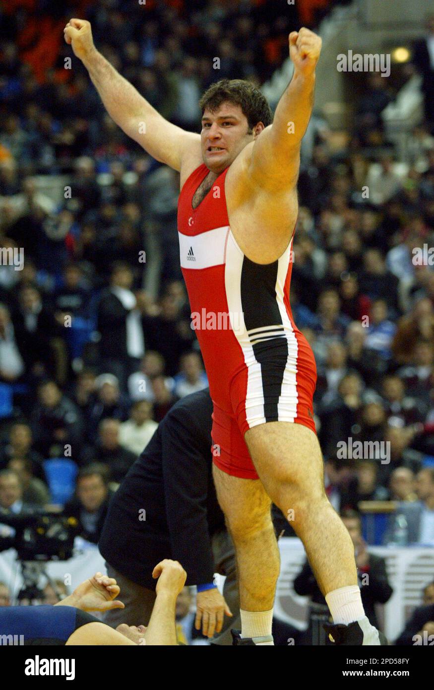 Turkey's Ismail Guzel, celebrates his victory over Finland's Juha ...