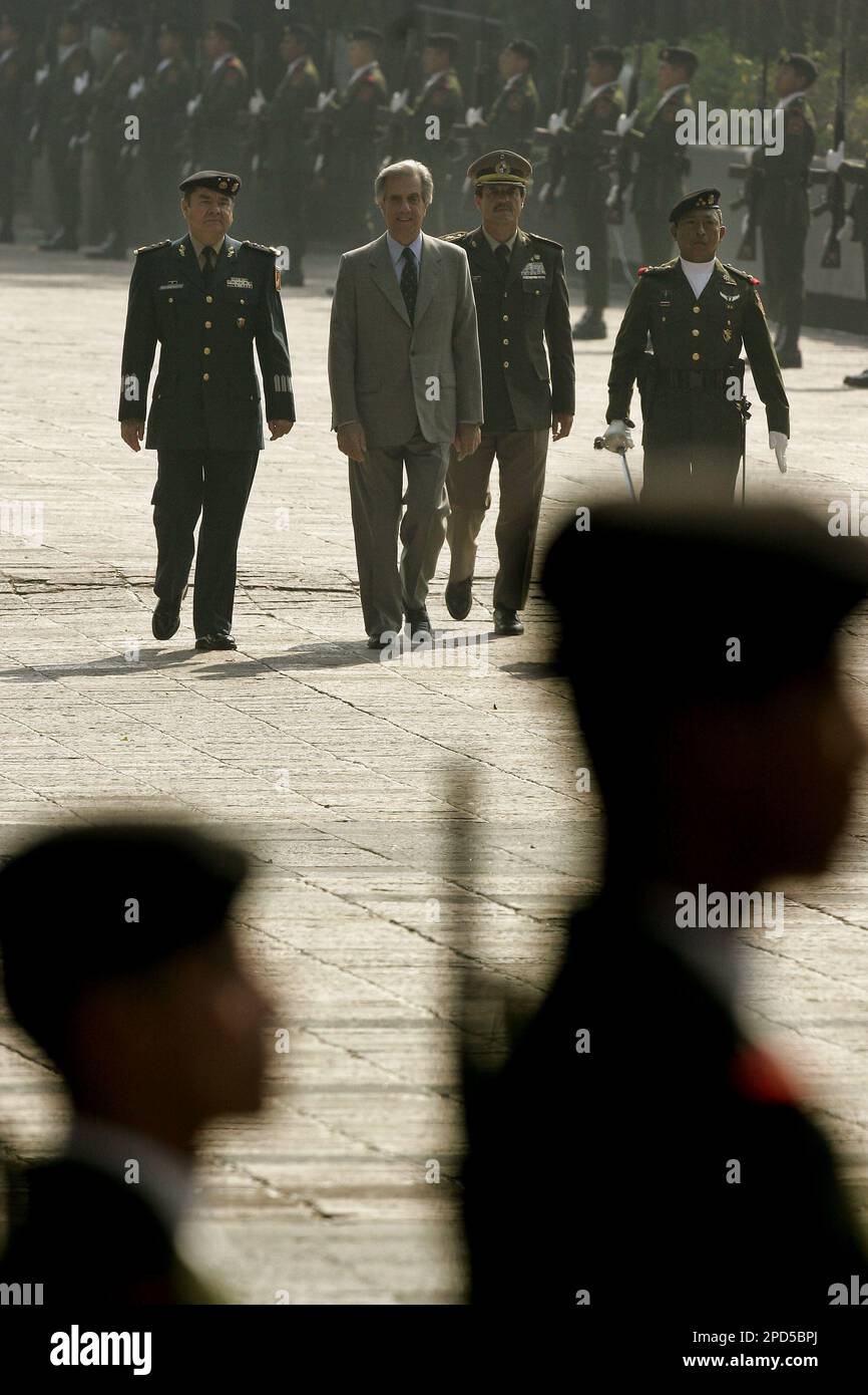 President of Uruguay Tabare Vazquez, center, walks past the Presidential Honor Guard at the ...