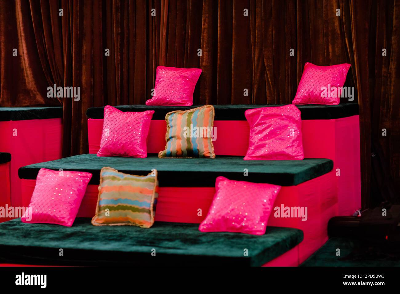 An interior shot of a seating arrangement featuring multiple cushioned ...