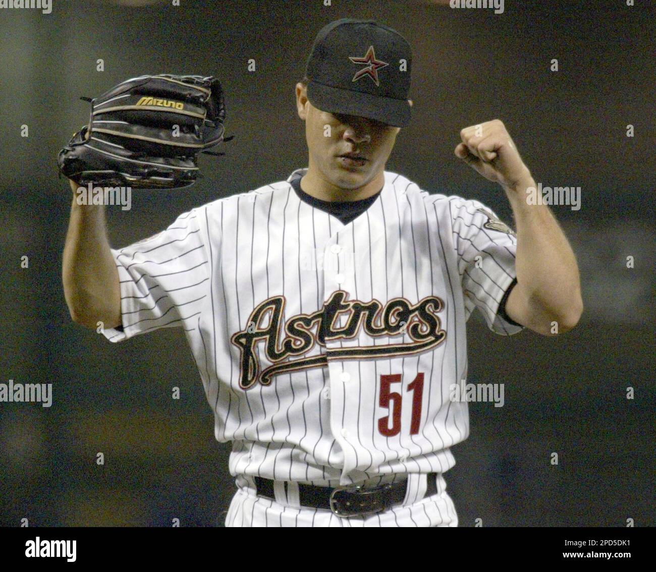 Houston Astros starting pitcher Wandy Rodriguez reacts after retiring ...