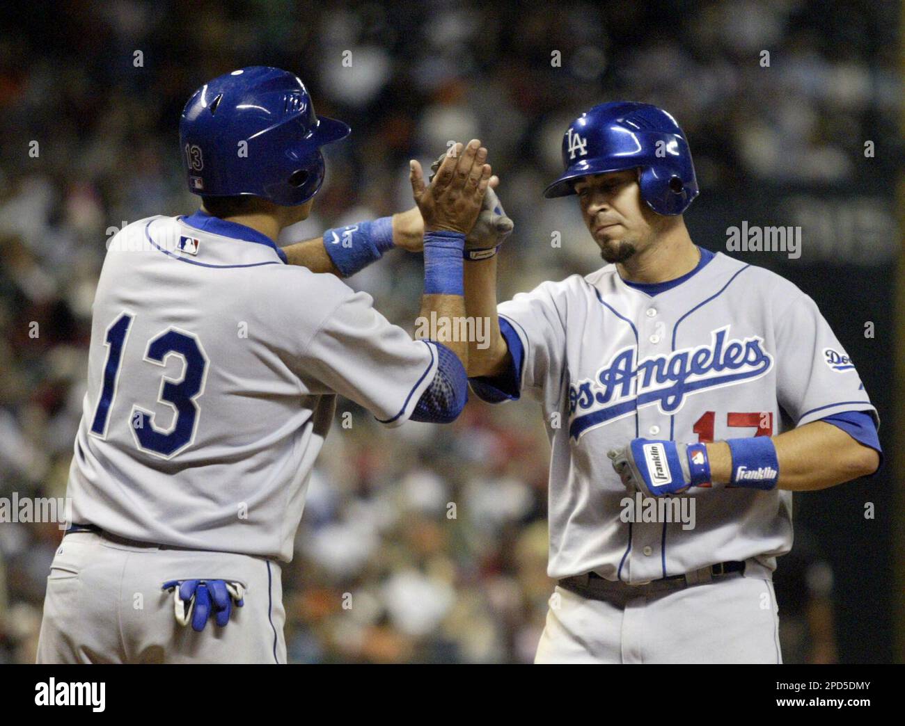 Los Angeles Dodgers' Jason Repko, right, is congratulated by teammate ...