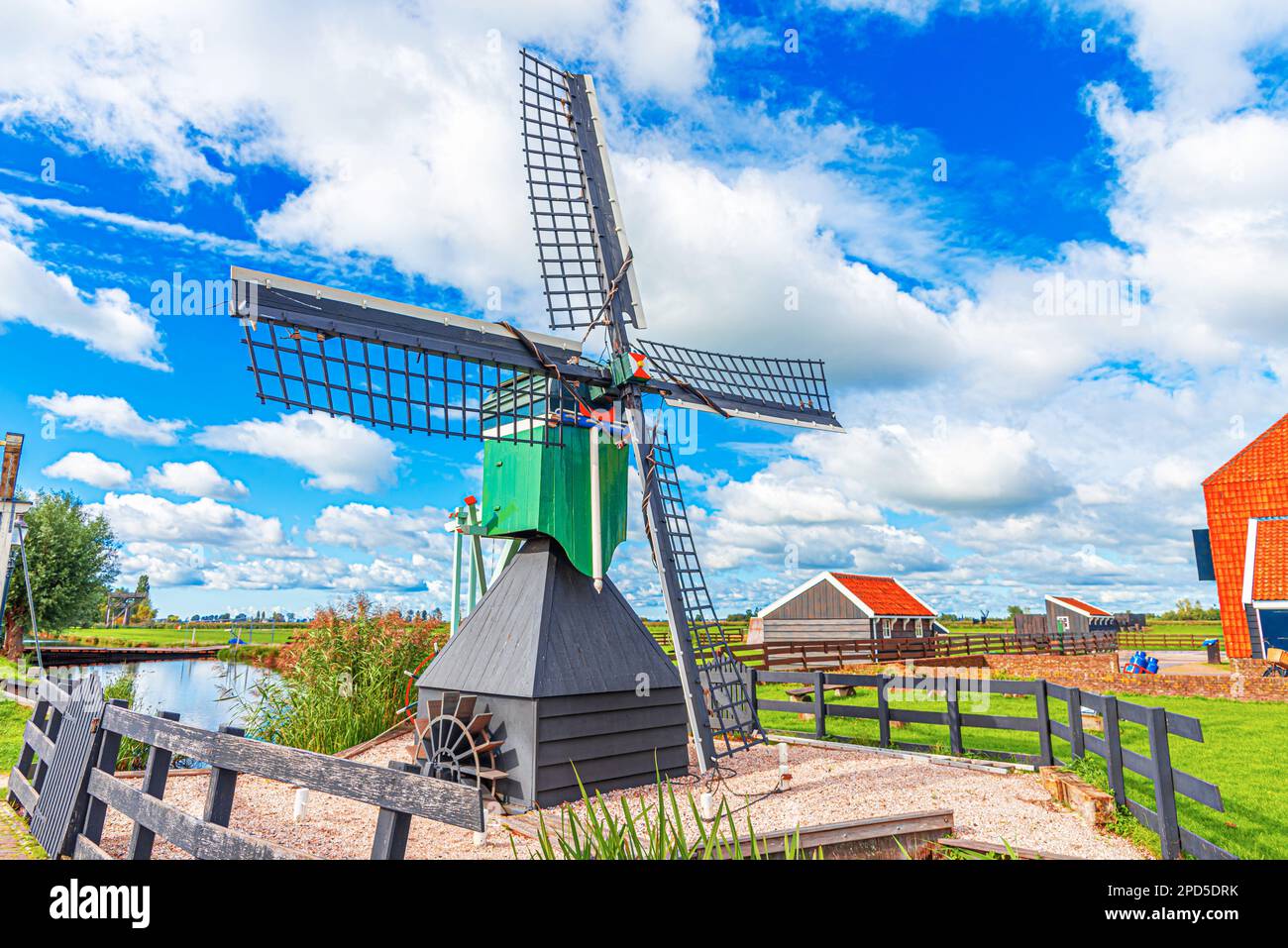 Traditional dutch windmill near the canal Stock Photo - Alamy