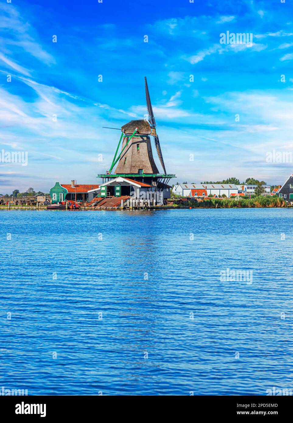 Traditional dutch windmill near the canal Stock Photo - Alamy