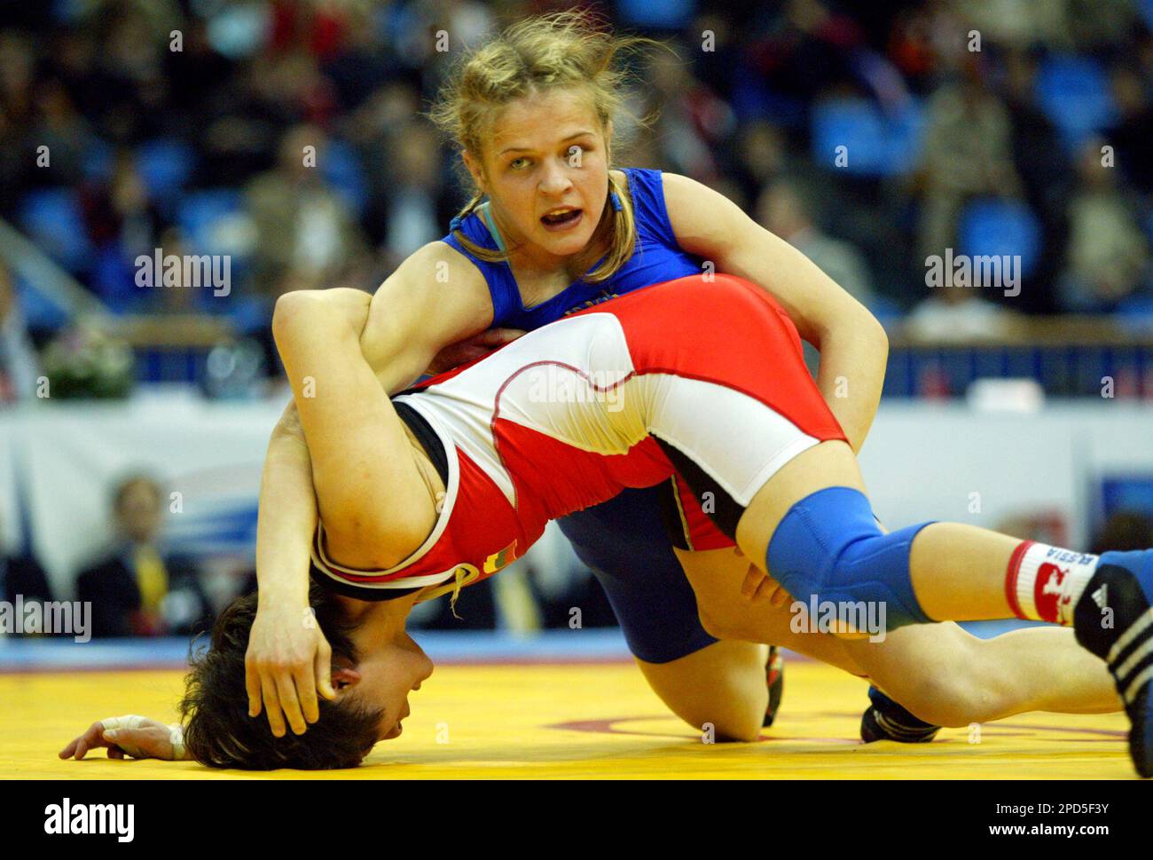 Russia's Lilya Kaskarakova, bottom, and Ukraina's Mariya Stadnyk ...