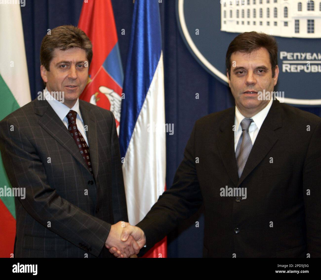 Bulgarian President Georgi Parvanov, left, shakes hands with Serbian ...