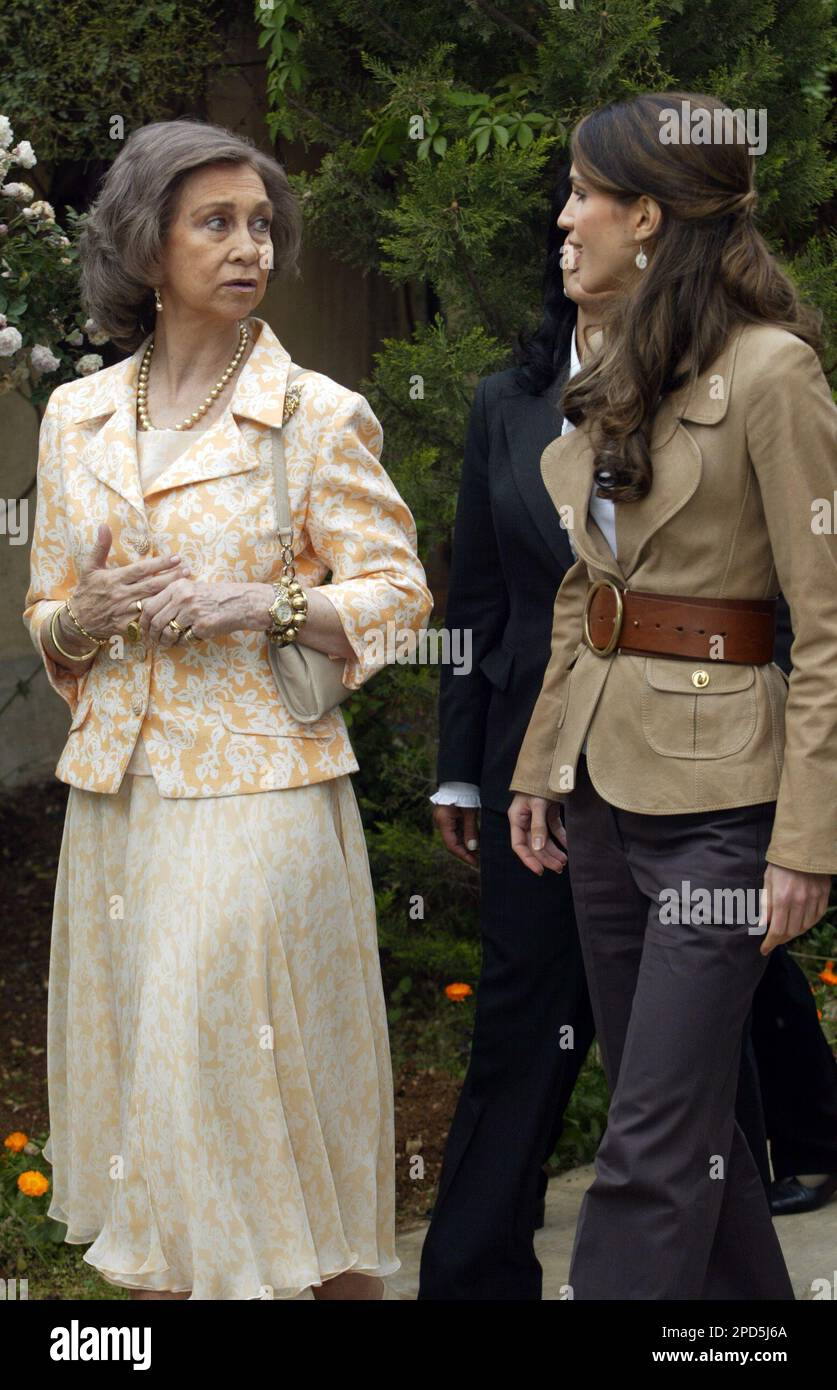 Queen Sofia of Spain, left, speaks with Jordan's Queen Rania, right, on ...