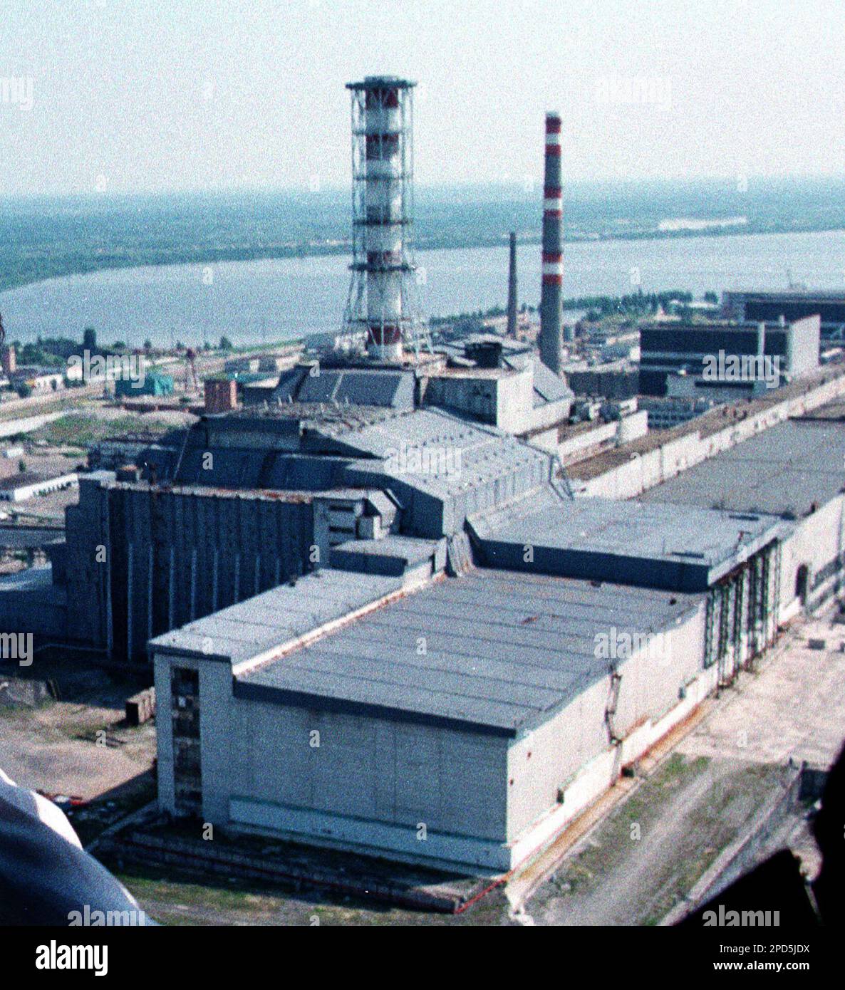 ** FILE ** A chimney towers over the sarcophagus that covers destroyed ...