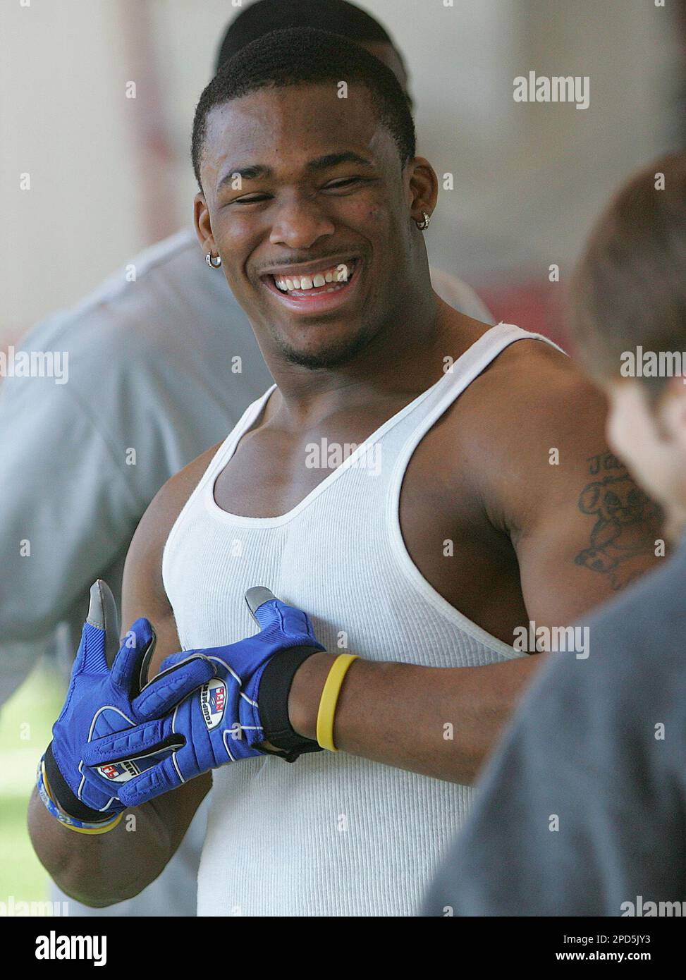 Memphis running back DeAngelo Williams laughs with friends as he takes ...