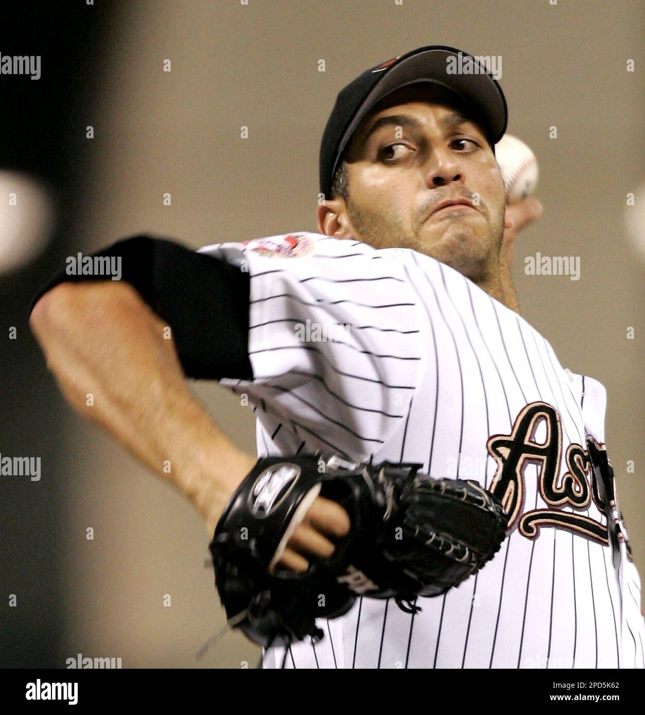 Houston Astros pitcher Andy Pettitte throws during the fifth inning of ...