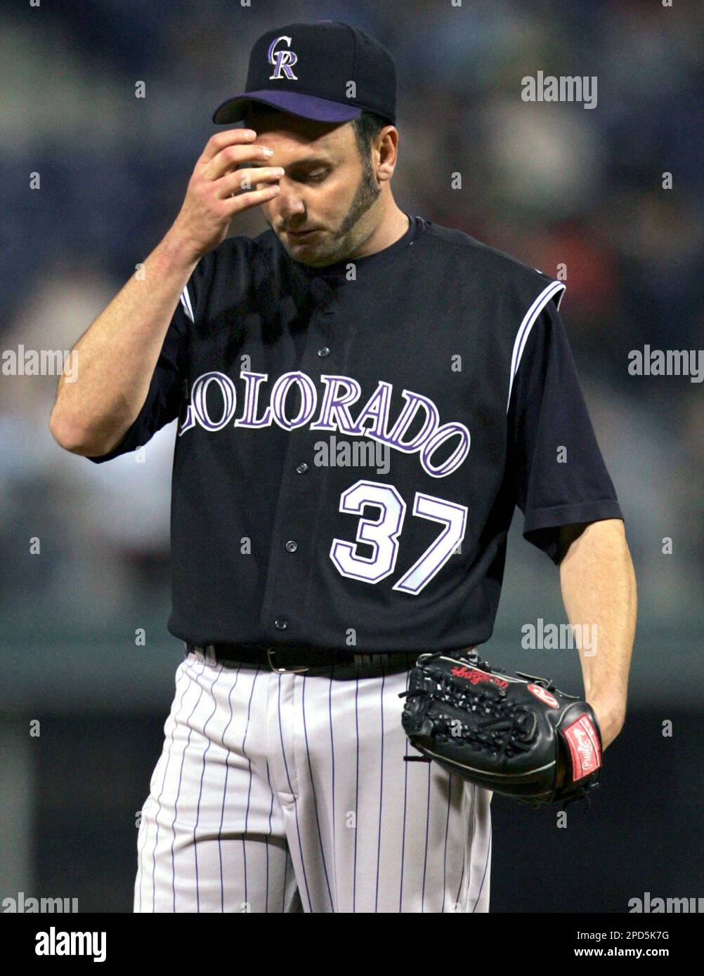 Colorado Rockies pitcher Josh Fogg reacts in the third inning as the ...