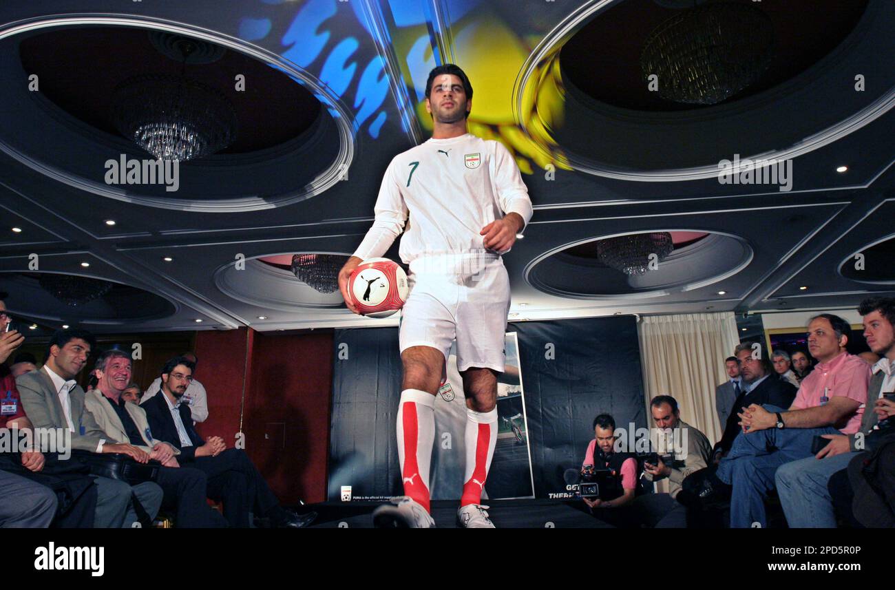 Models wear the Iranian national soccer team's new kit for the upcoming ...
