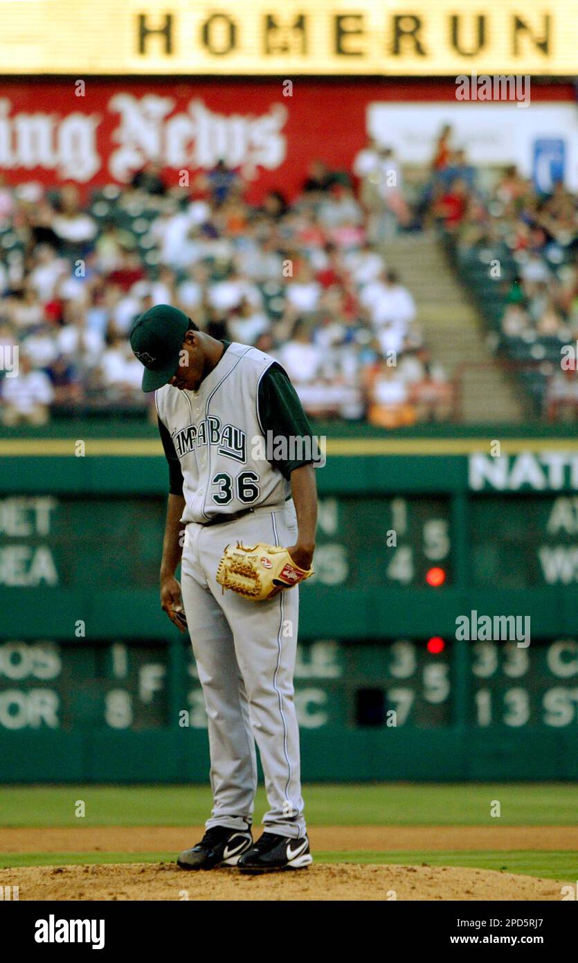 Tampa Bay Devil Rays pitcher Edwin Jackson hangs his head after giving ...