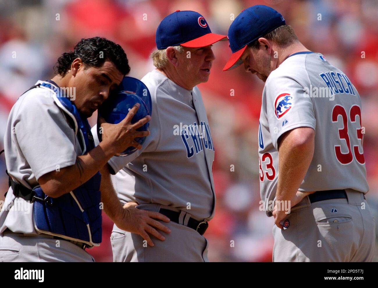 Chicago Cubs' pitcher Glendon Rusch, right, talks with pitching coach ...
