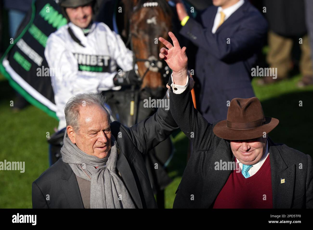 Owner Michael Buckley and trainer Nicky Henderson (right) after winning ...