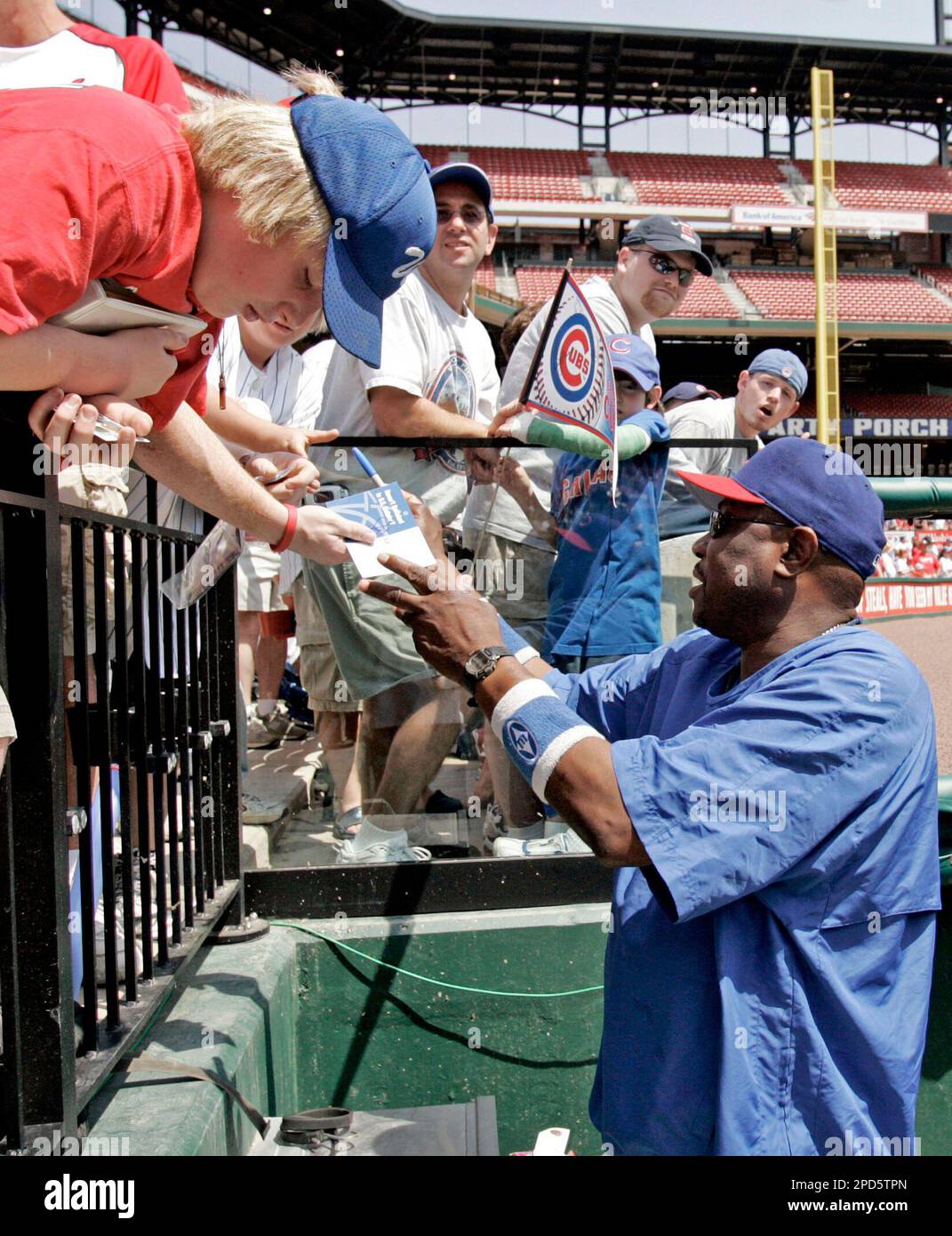 Chicago Cubs manager Dusty Baker signs autographs for fans during ...