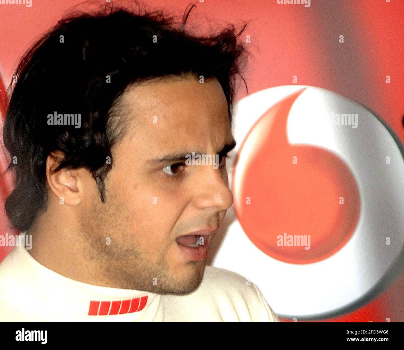 Brazil's Felipe Massa reacts at Ferrari pits during practice for Sunday ...
