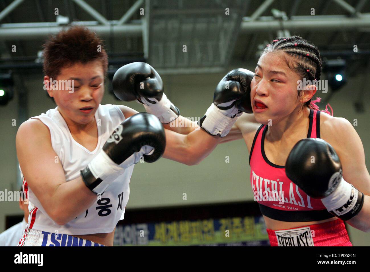 South Korean Champion Kim Ju-hee, right, fights with Japanese ...